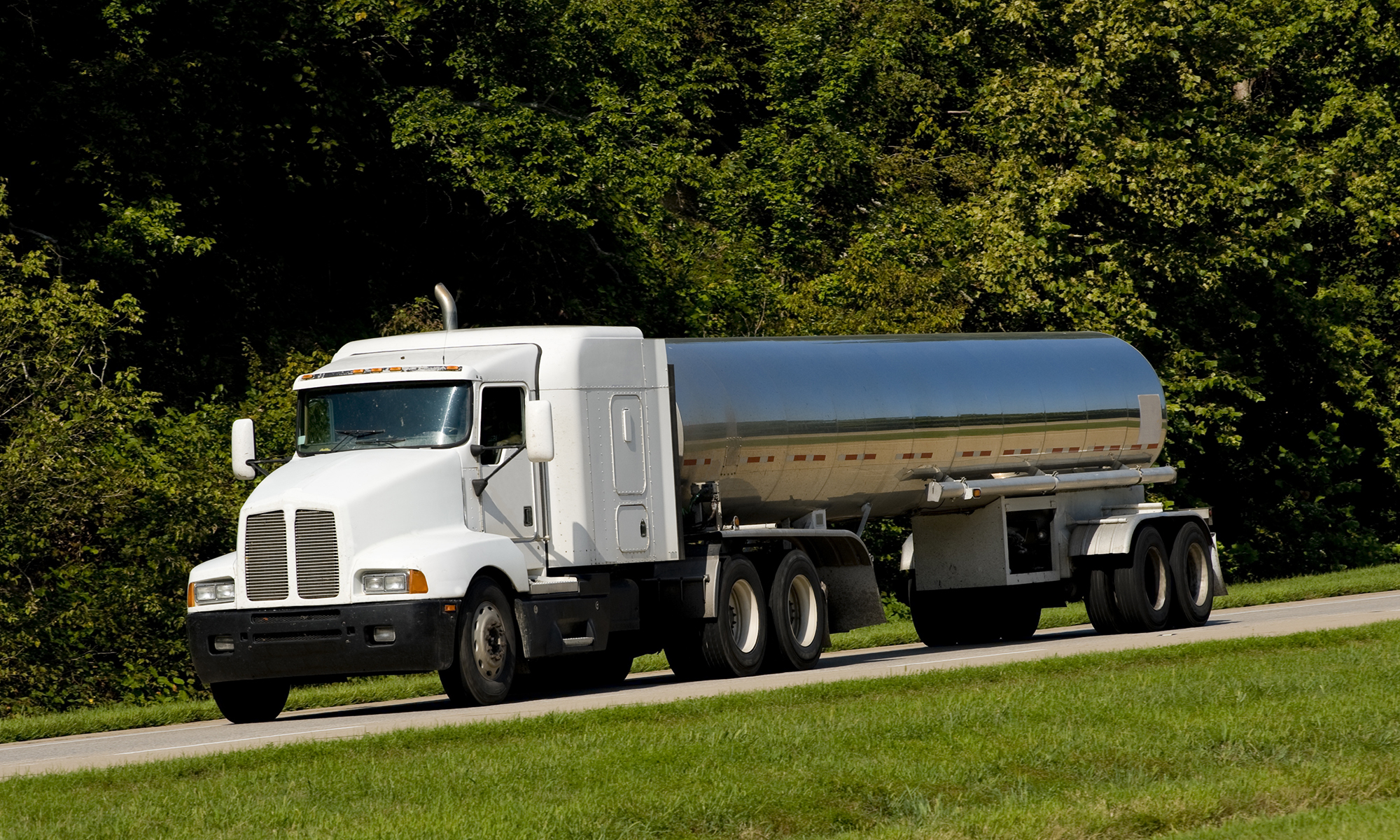 A fuel tanker transport truck on a highway, fuel transportaion – PTC